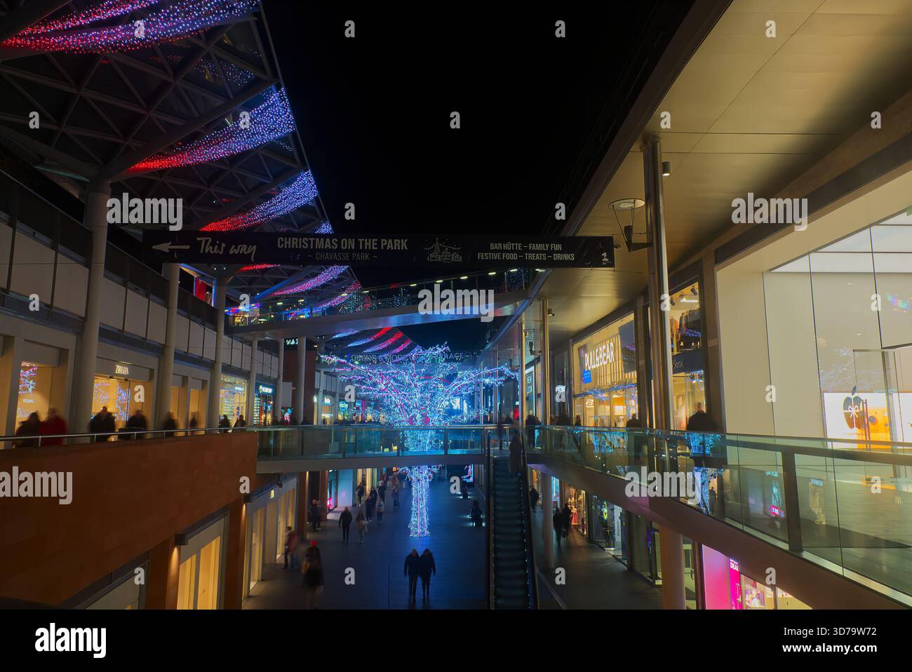 Liverpool ONE at night, showcasing the large neon Christmas tree ...