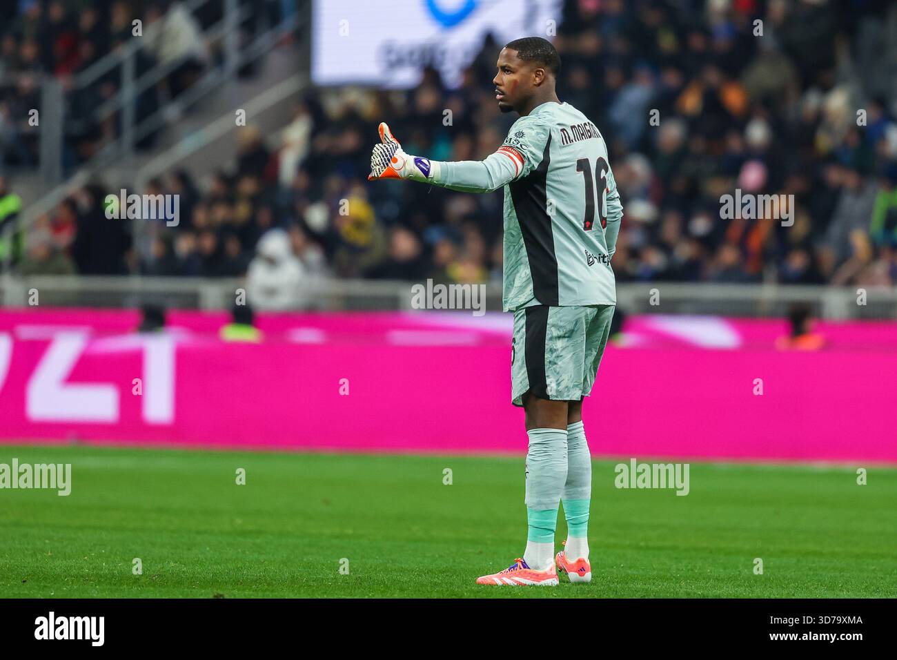 Mike Maignan of AC Milan gestures during Serie A 2025/26 football match ...