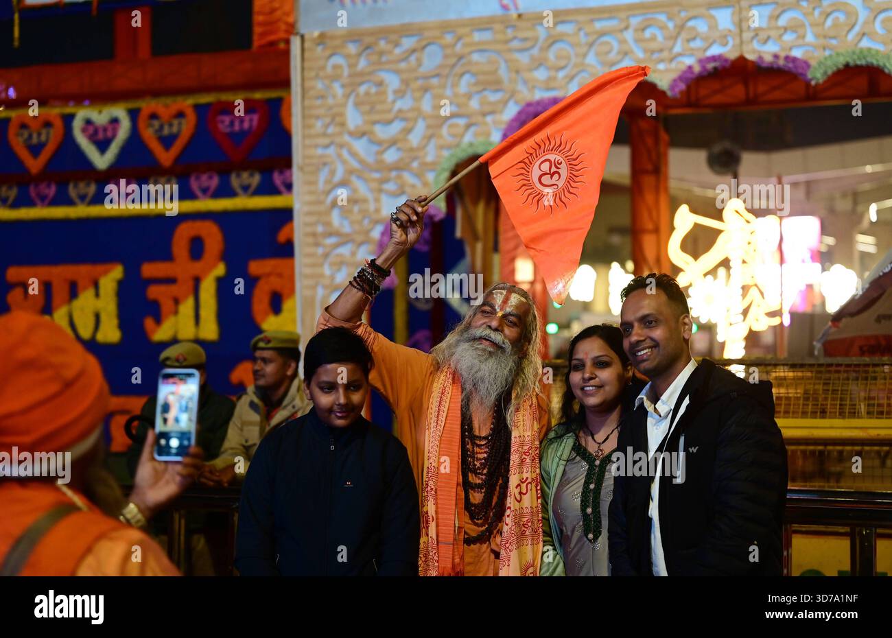 AYODHYA, INDIA - NOVEMBER 24: A devotee family click picture with a ...