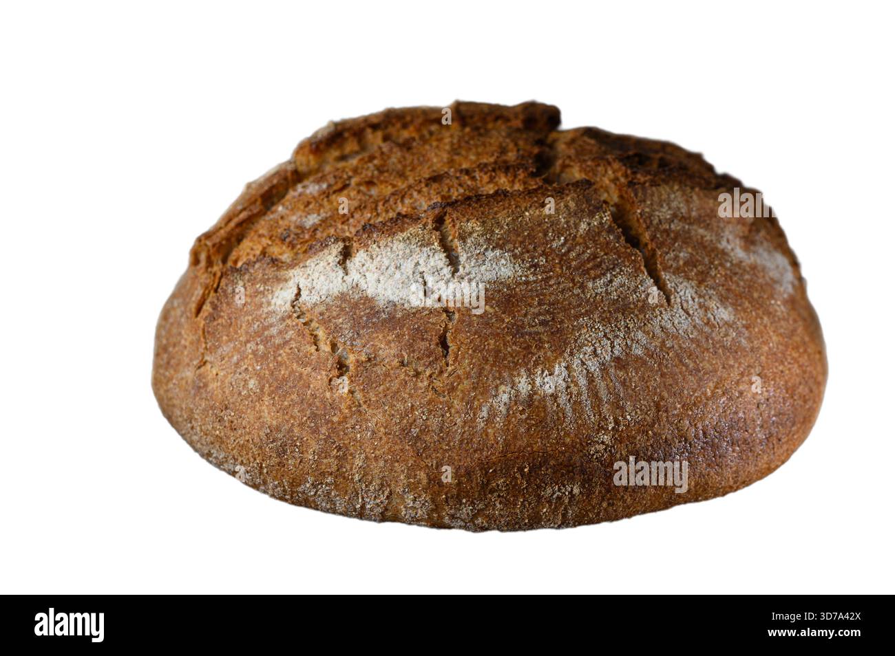A rustic round whole grain bread loaf with crackled crust and hearty ...