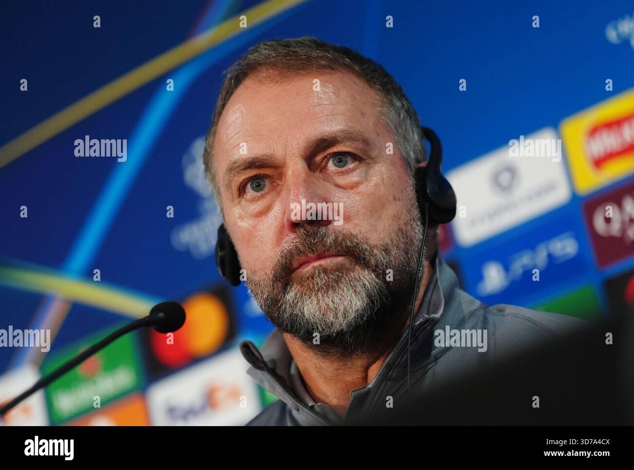 Barcelona manager Hansi Flick during a press conference at Stamford ...