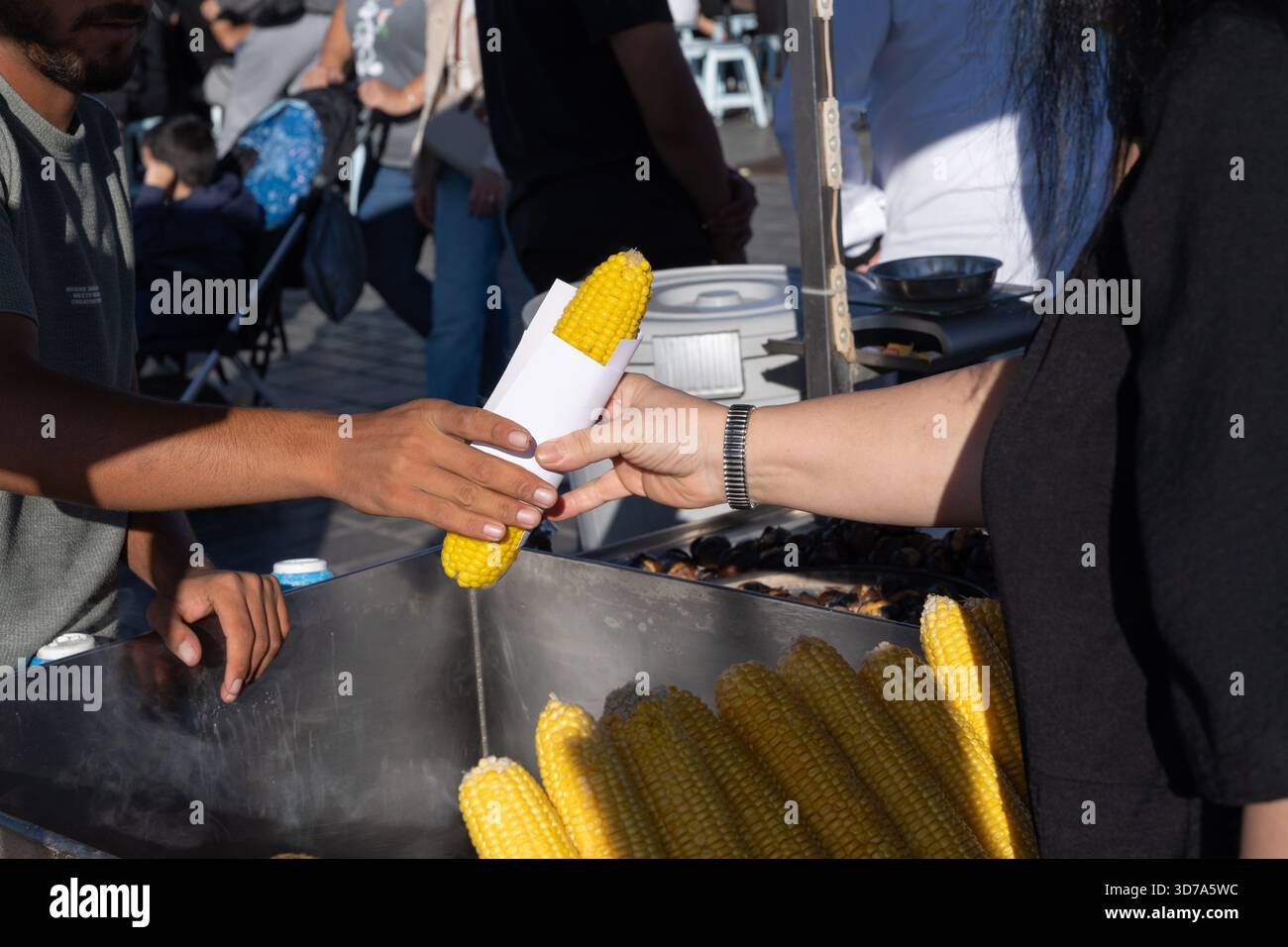 Istanbul, Turkey. September 18th 2025. A customer buying freshly boiled ...