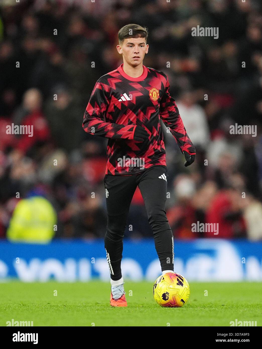 Manchester United's Shea Lacey warms up before the Premier League match ...
