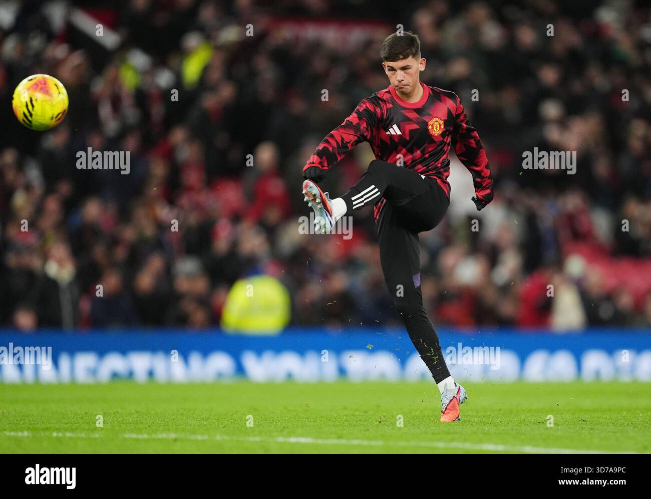 Manchester United's Shea Lacey warms up before the Premier League match ...