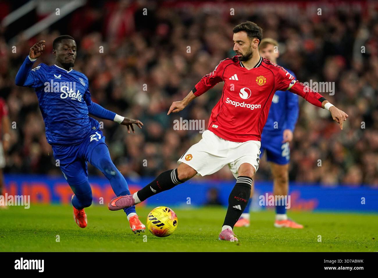 Everton's Idrissa Gueye, left, challenges Manchester United's Bruno ...
