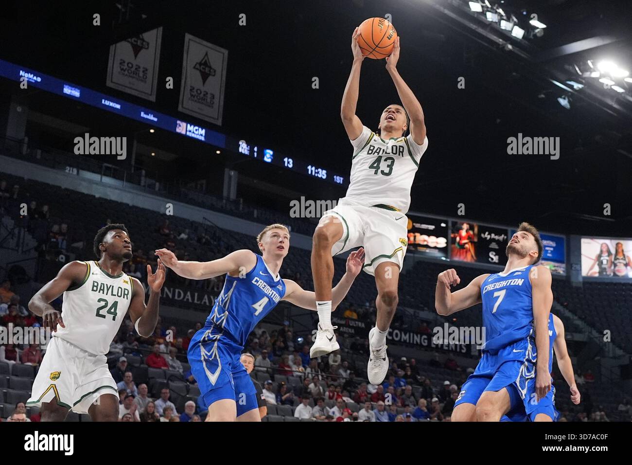 Baylor guard Cameron Carr (43) drives to the basket past Creighton ...