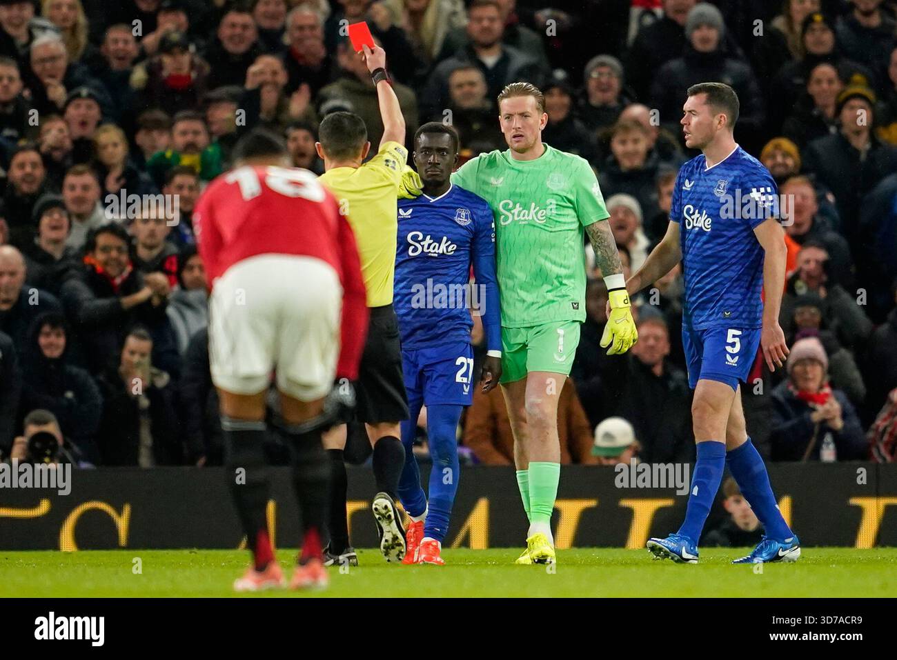 Everton's Idrissa Gueye, third right, gets a red card during the ...