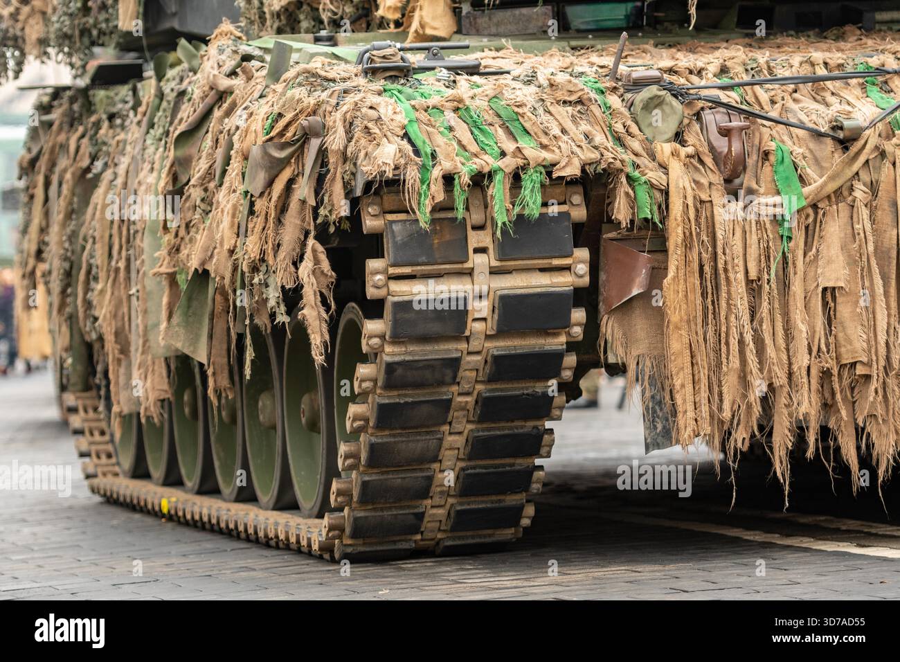 Detail of an armored tank moving on the road Stock Photo - Alamy