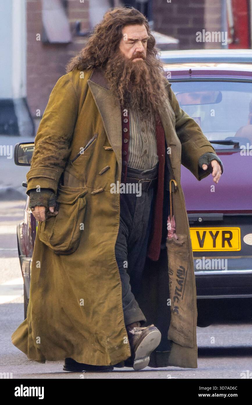 Actors Nick Frost (as Hagrid) and Dominic McLaughlin (as Harry Potter ...