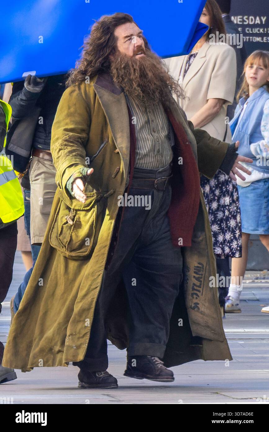 Actors Nick Frost (as Hagrid) and Dominic McLaughlin (as Harry Potter ...