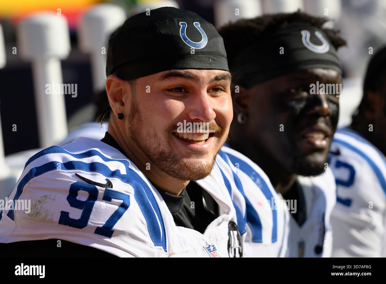 Indianapolis Colts defensive end Laiatu Latu talks to teammates on the ...