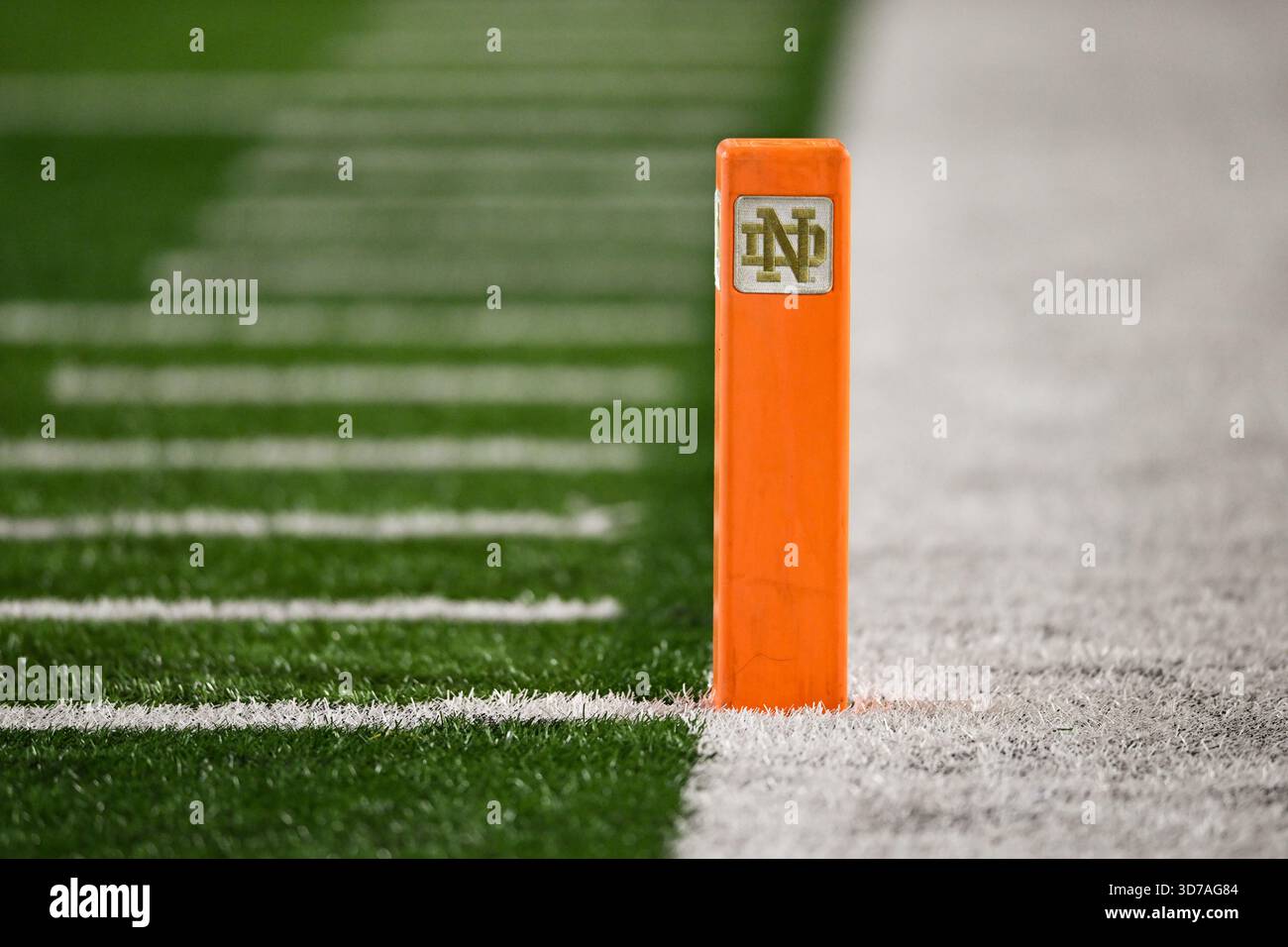 SOUTH BEND, IN - NOVEMBER 22: An end zone pylon with a Notre Dame logo ...
