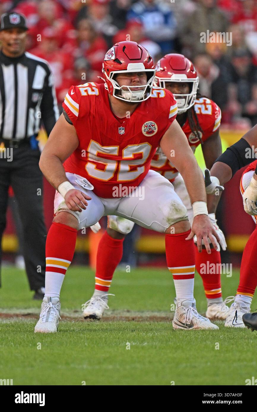 Kansas City Chiefs center Creed Humphrey (52) gets set on the line of ...
