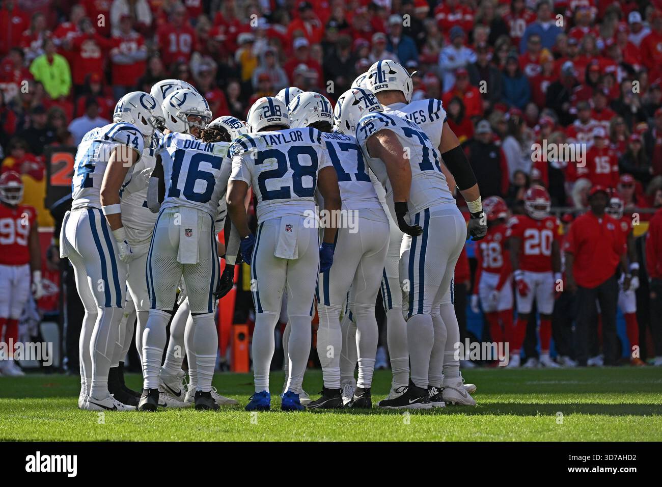 The Indianapolis Colts offense huddles during an NFL football game ...