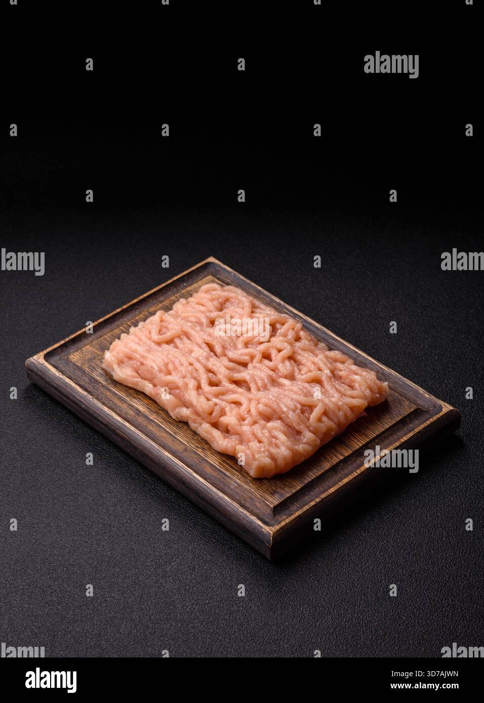 Raw ground chicken for burgers and other food. Raw minced chicken meat ...
