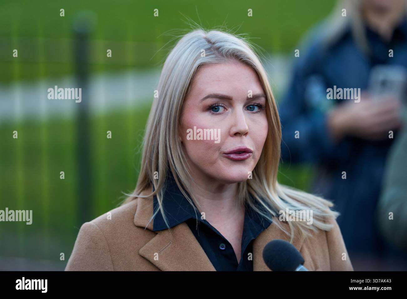 White House Press Secretary Karoline Leavitt speaks to members of the ...