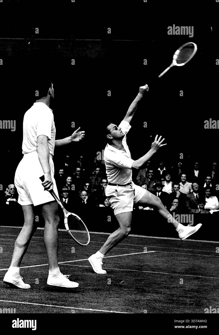 Racket into crowd Black and White Stock Photos & Images - Alamy