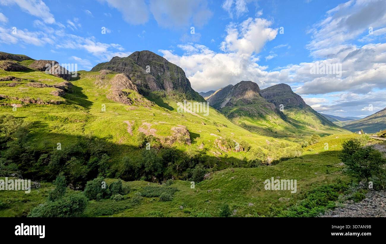 Iconic green mountains of Glencoe captured on a bright and beautiful ...