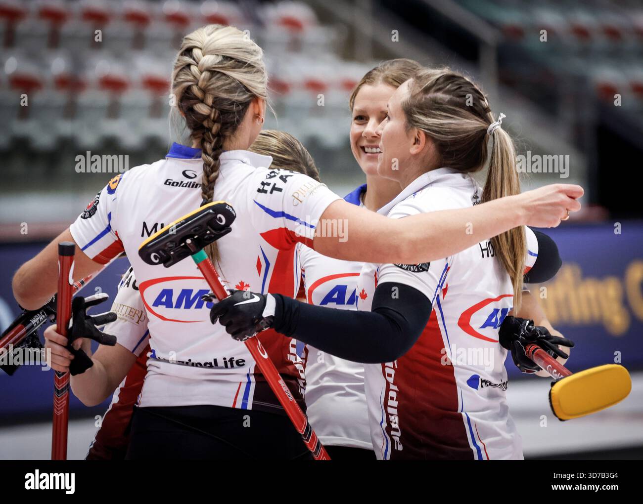 Team Homan, left to right, second Emma Miskew, third Tracy Fleury, lead ...