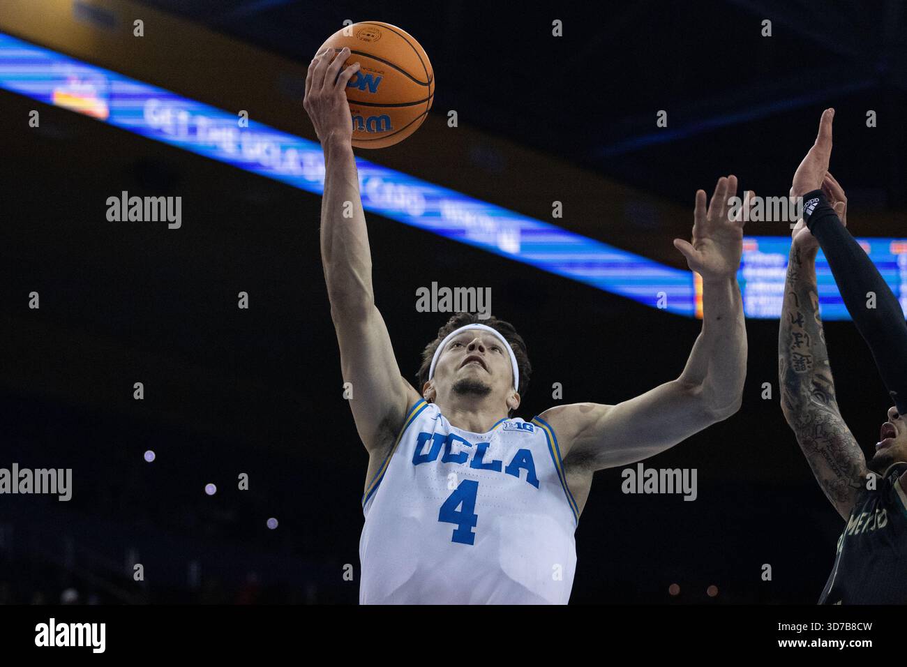 LOS ANGELES, CA - NOVEMBER 18: Jamar Brown #4 of the UCLA Bruins drives ...