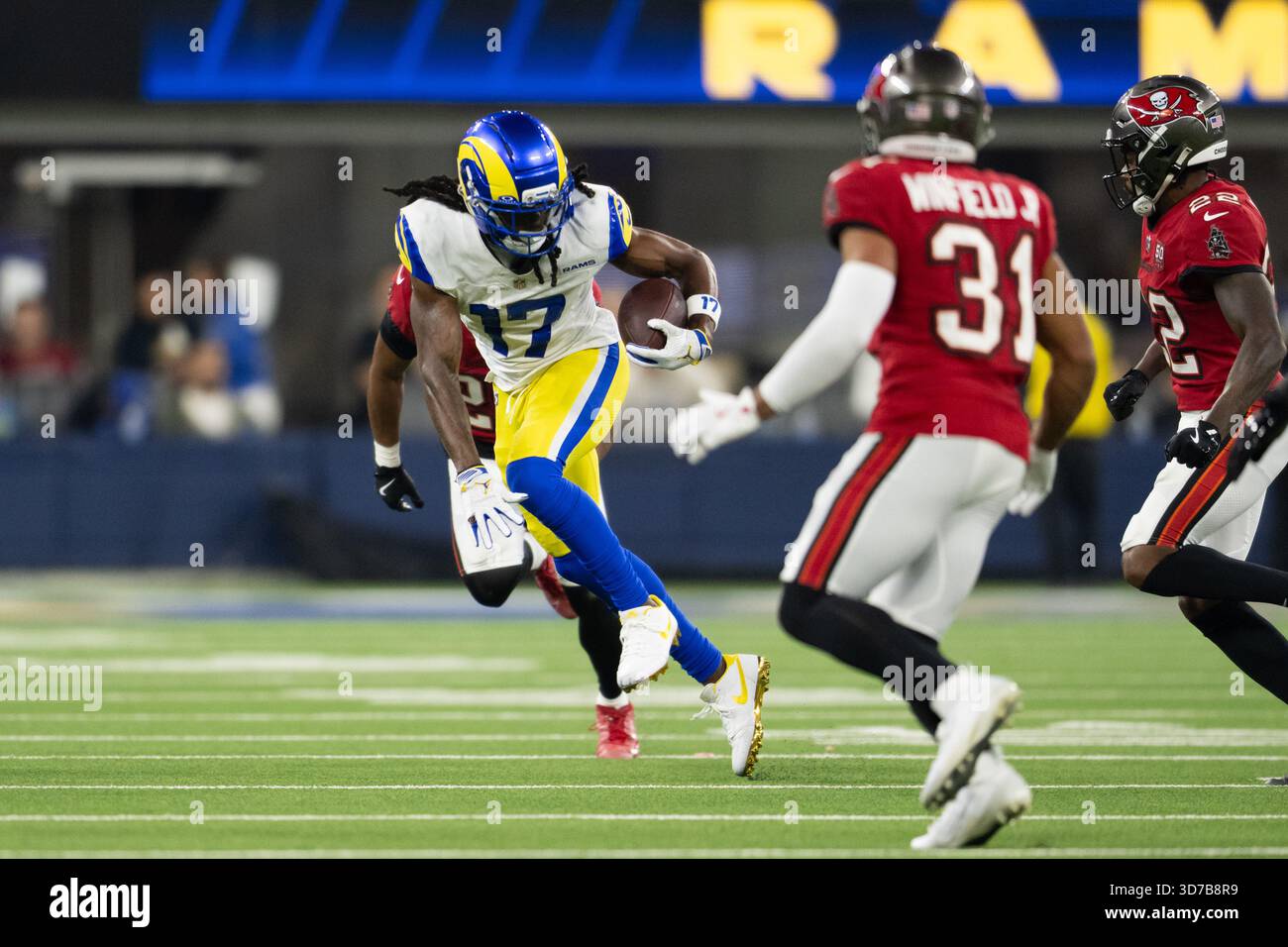 Los Angeles Rams wide receiver Davante Adams (17) runs with the ball ...