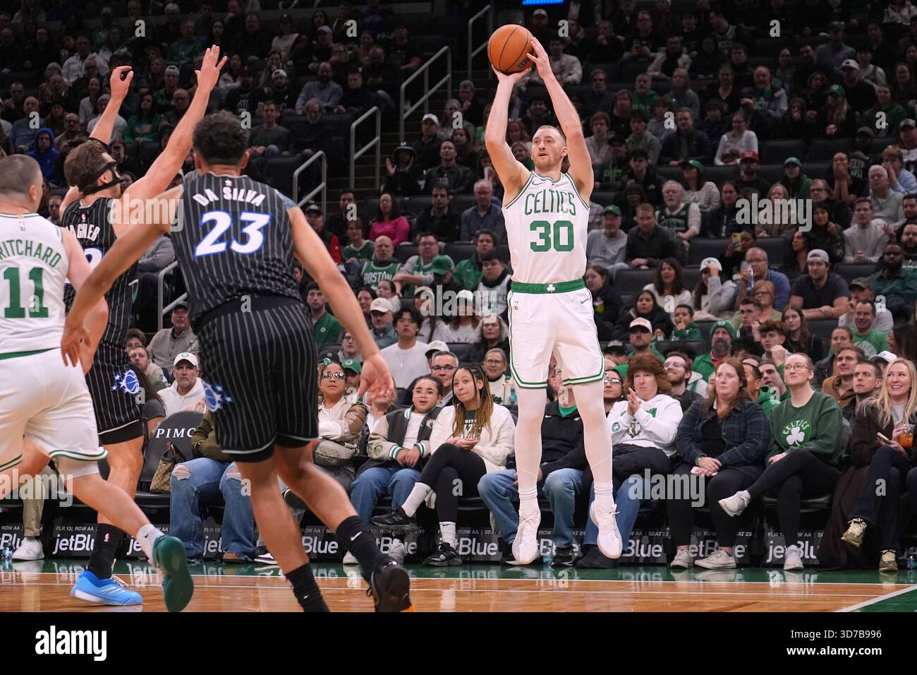 Boston Celtics forward Sam Hauser (30) shoots during the first half of ...