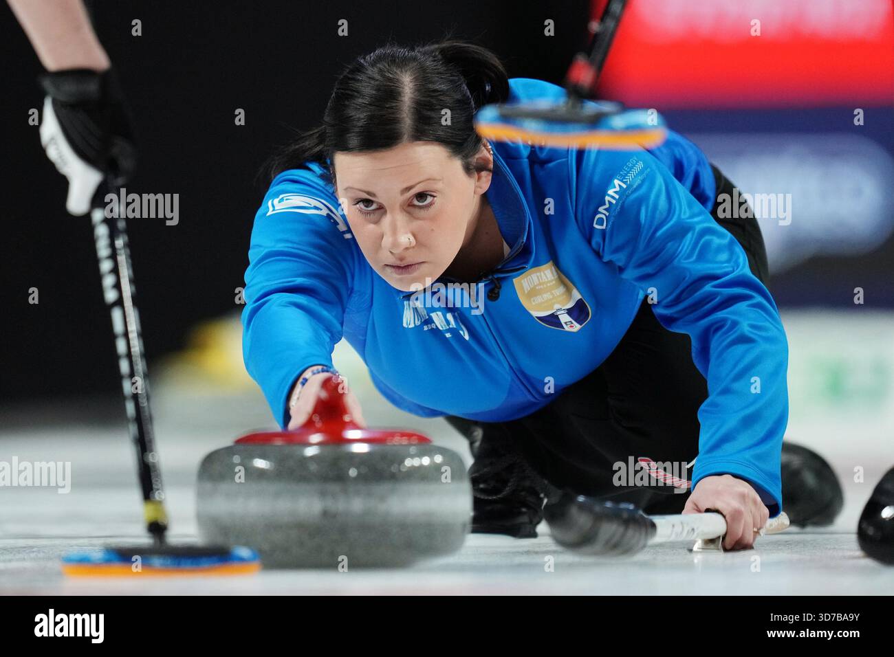 Kate Cameron delivers a rock during Canadian Olympic curling trials ...