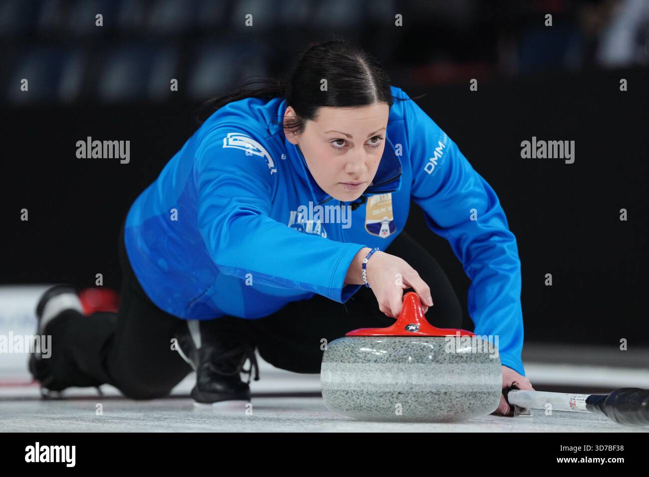 Kate Cameron delivers a rock during Canadian Olympic curling trials ...