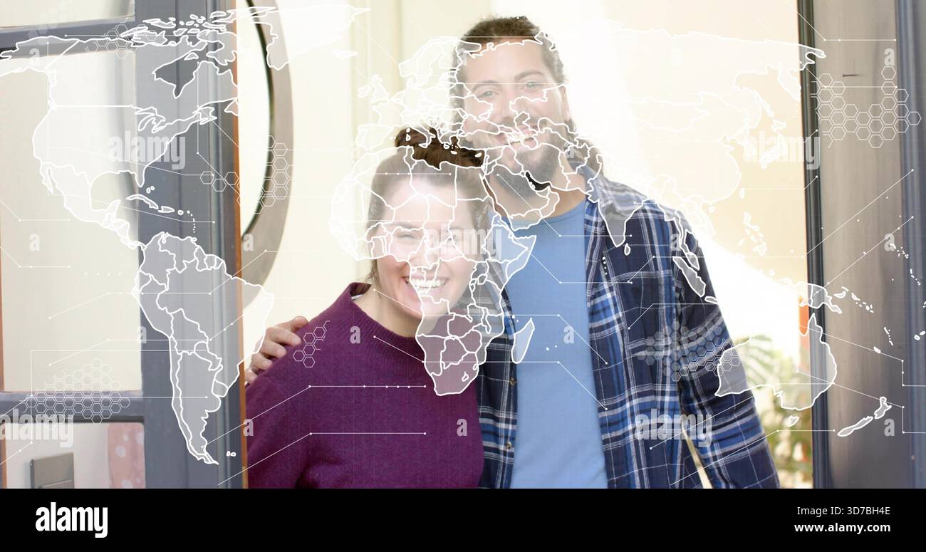 Posing couple smiling embracing at front door wearing plaid shirt and ...