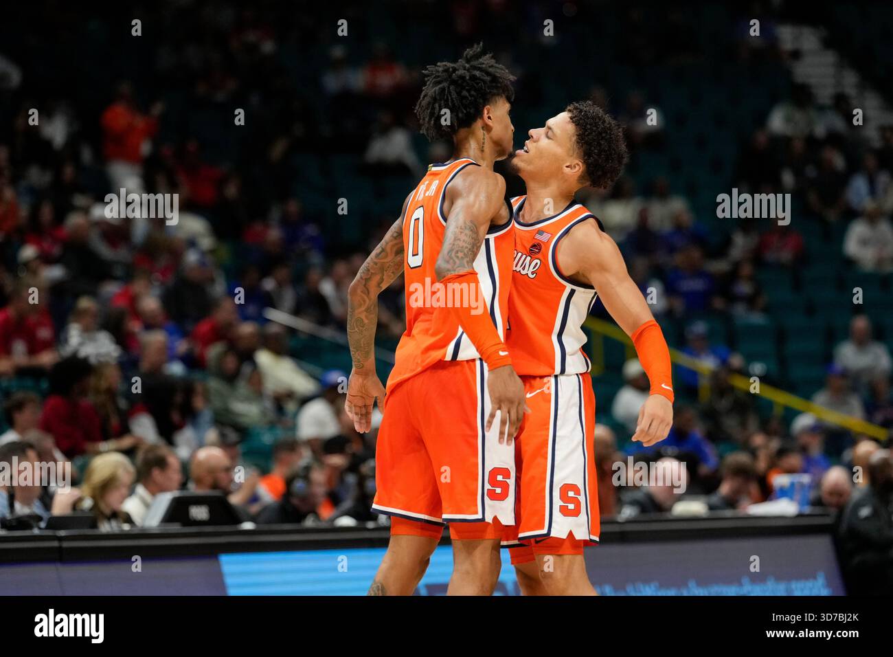 Syracuse guard Nate Kingz, right, celebrates with forward Sadiq White ...