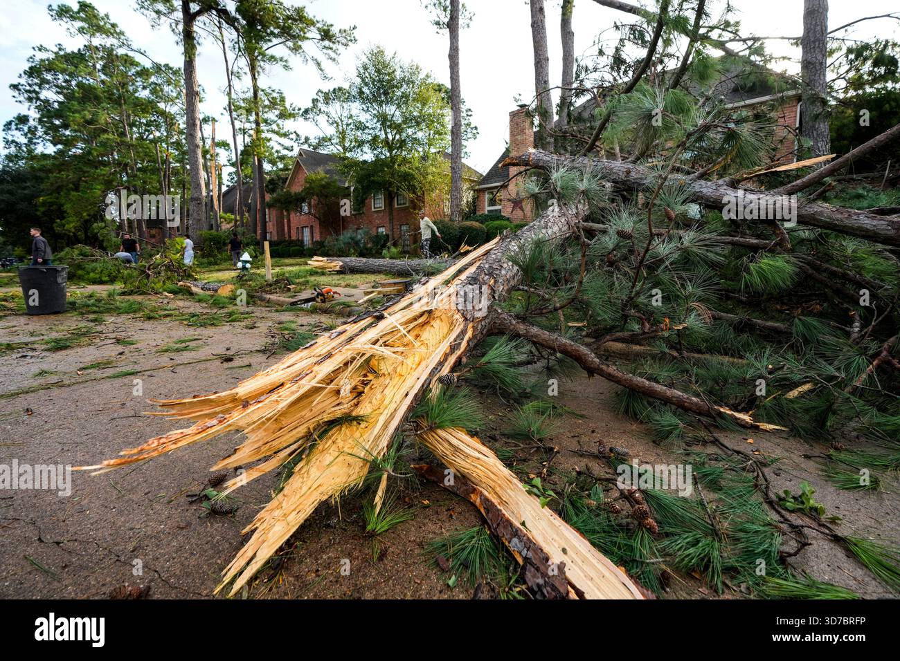 Residents clean up storm damage in the Memorial Northwest subdivision ...