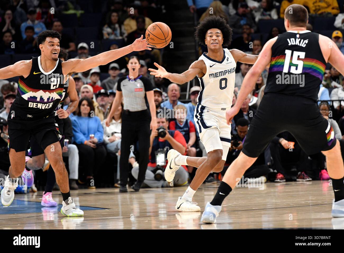 Denver Nuggets forward Spencer Jones (21) and Memphis Grizzlies forward ...