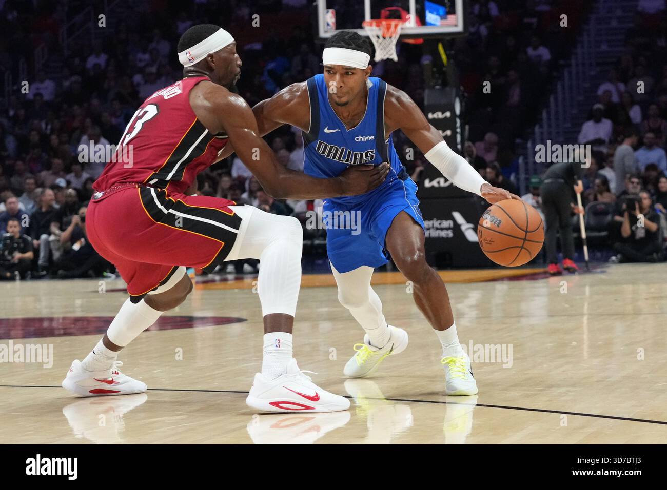 Miami Heat center Bam Adebayo (13) defends Dallas Mavericks guard ...