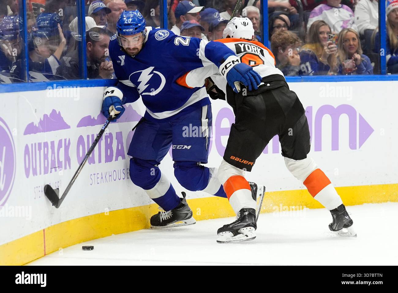 Tampa Bay Lightning left wing Nick Paul (20) works around Philadelphia ...