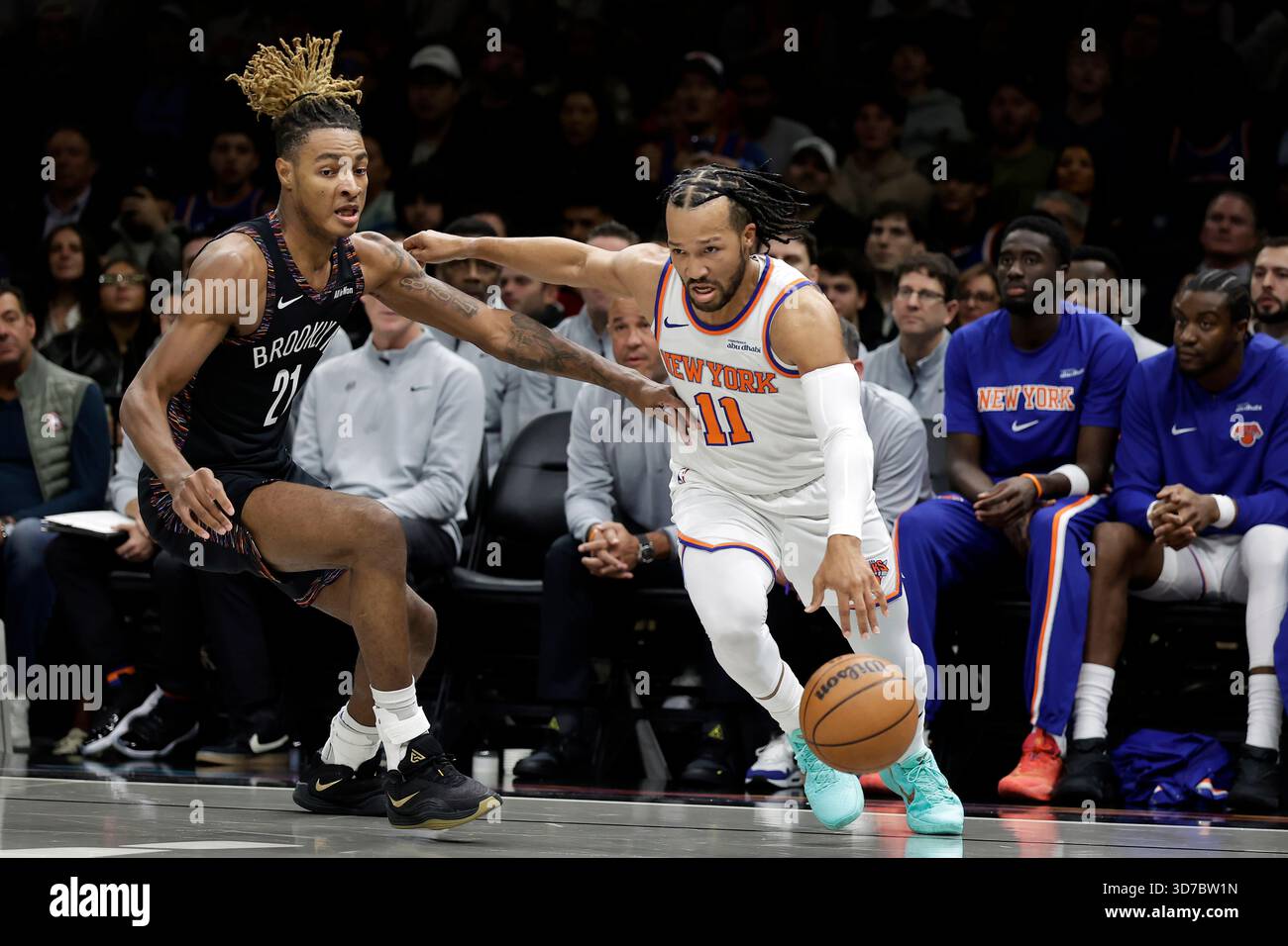 New York Knicks guard Jalen Brunson (11) drives past Brooklyn Nets ...