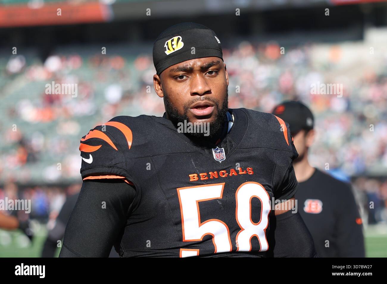Cincinnati Bengals defensive end Joseph Ossai (58) leaves the field ...