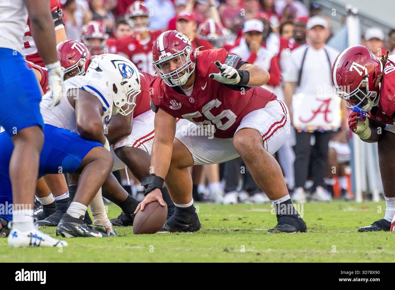 Alabama offensive lineman Geno VanDeMark (56) signals at the line ...