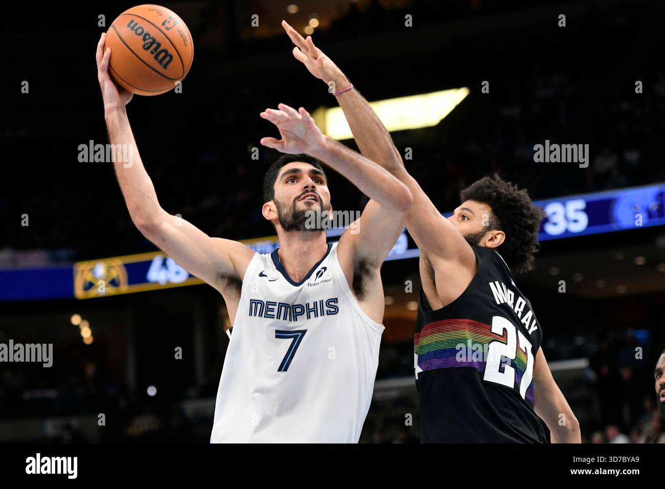 Memphis Grizzlies forward Santi Aldama (7) shoots against Denver Nuggets guard Jamal Murray (27 ...