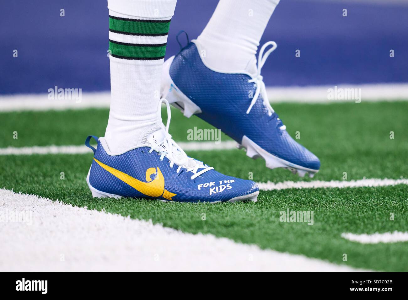 The cleats of Philadelphia Eagles quarterback Tanner McKee are visible ...