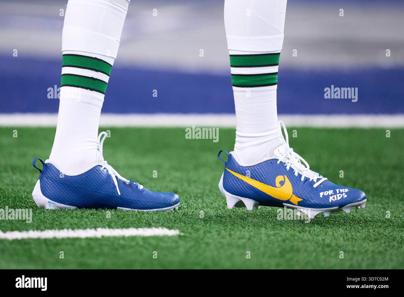 The cleats of Philadelphia Eagles quarterback Tanner McKee are visible ...