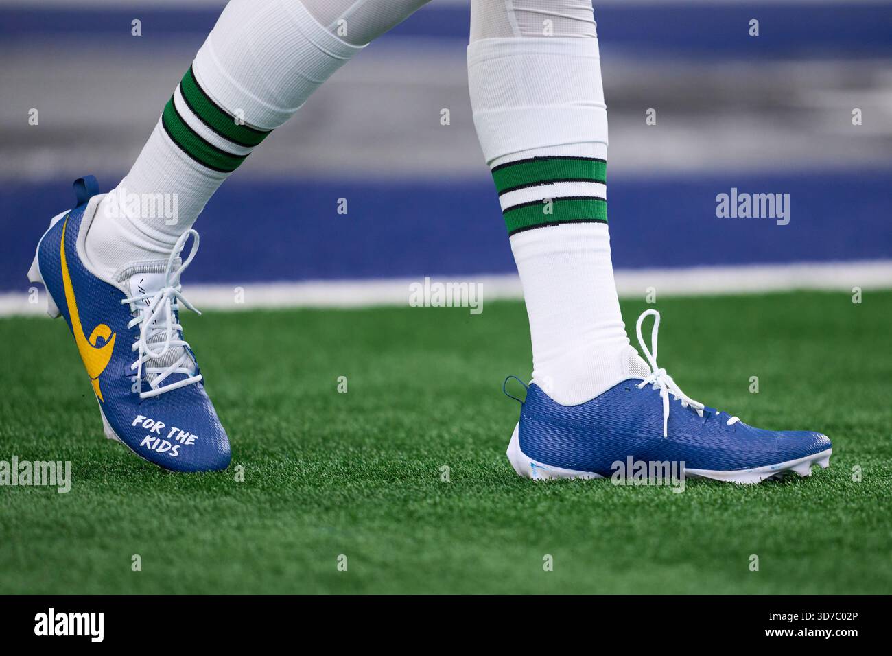 The cleats of Philadelphia Eagles quarterback Tanner McKee are visible ...