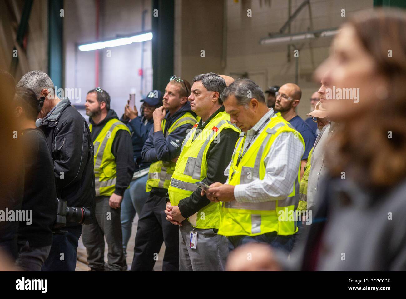 Septa personnel listen as Pennsylvania Governor Josh Shapiro makes ...