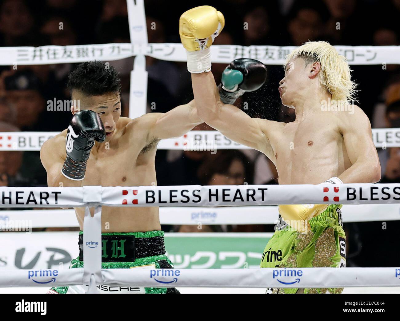 Takuma Inoue (L) of Japan and compatriot Tenshin Nasukawa trade punches ...