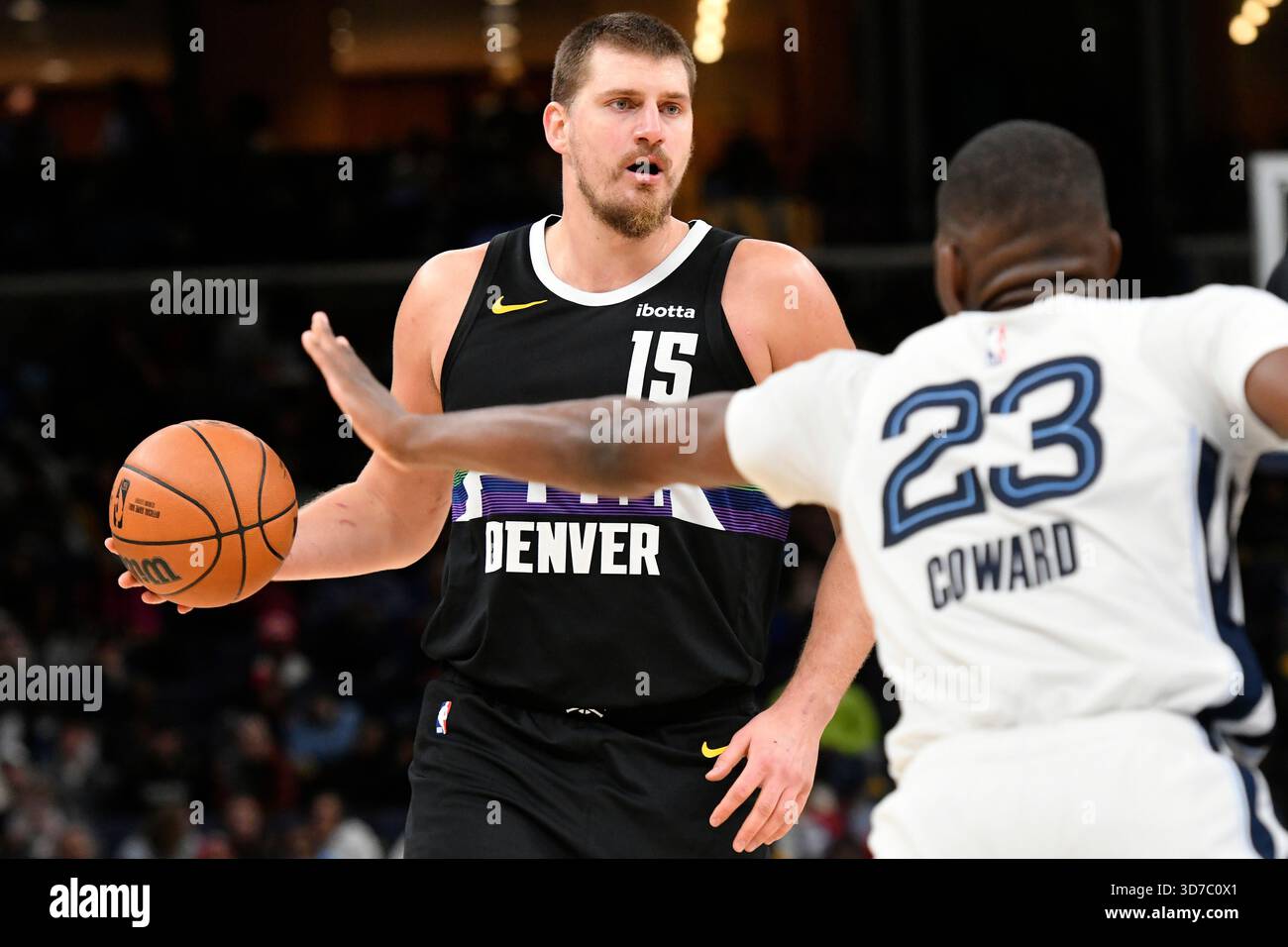 Denver Nuggets center Nikola Jokic (15) handles the ball against ...
