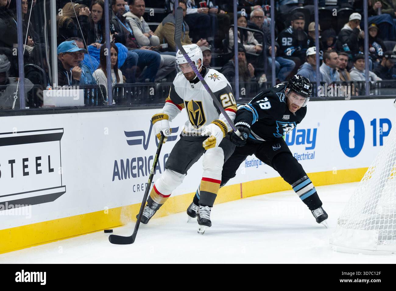 Utah Mammoth defenseman Ian Cole (28) and Vegas Golden Knights left ...