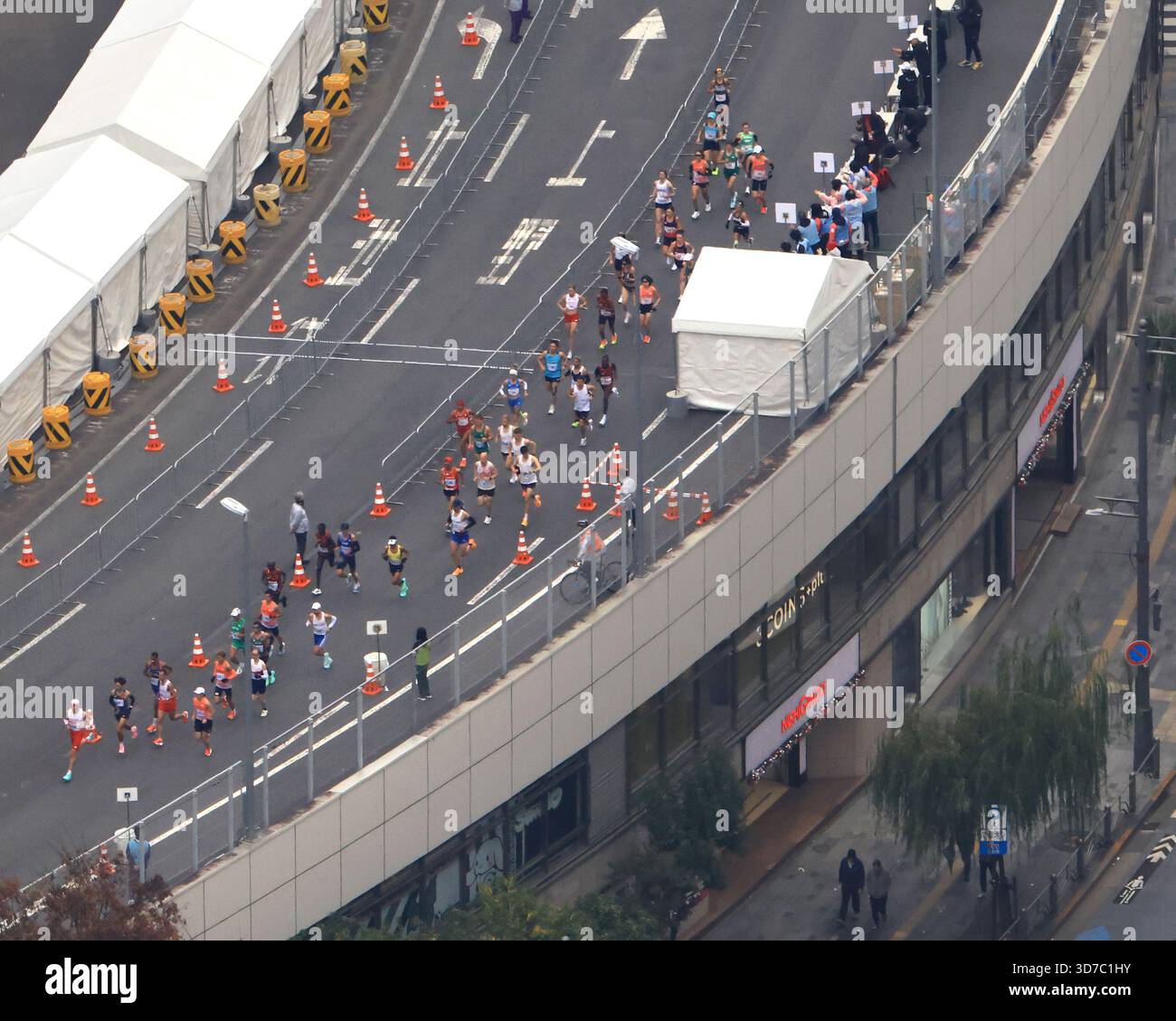 An aerial photo shows athletes compete in the Men's Marathon at the ...