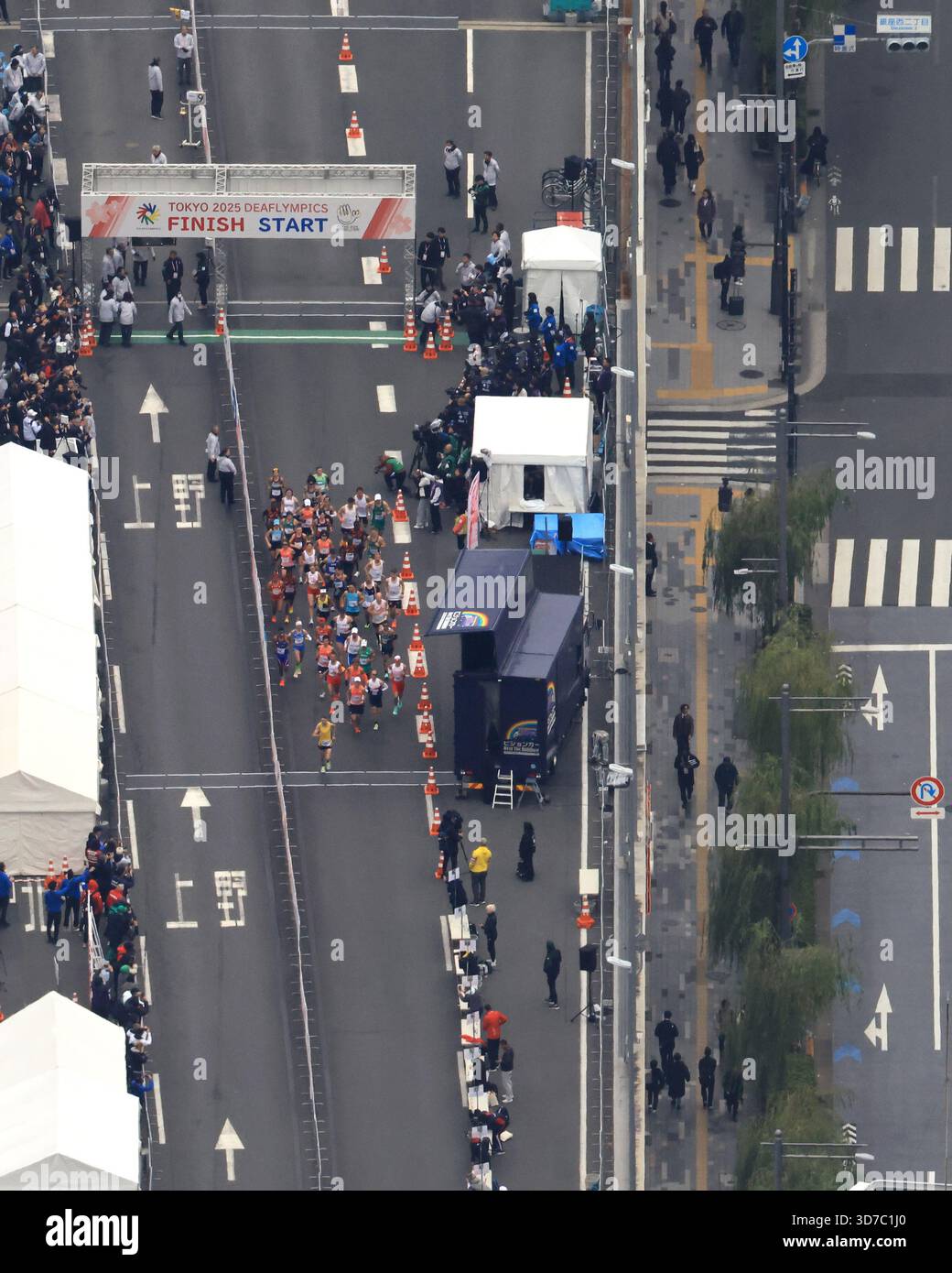 An aerial photo shows athletes compete in the Men's Marathon at the ...