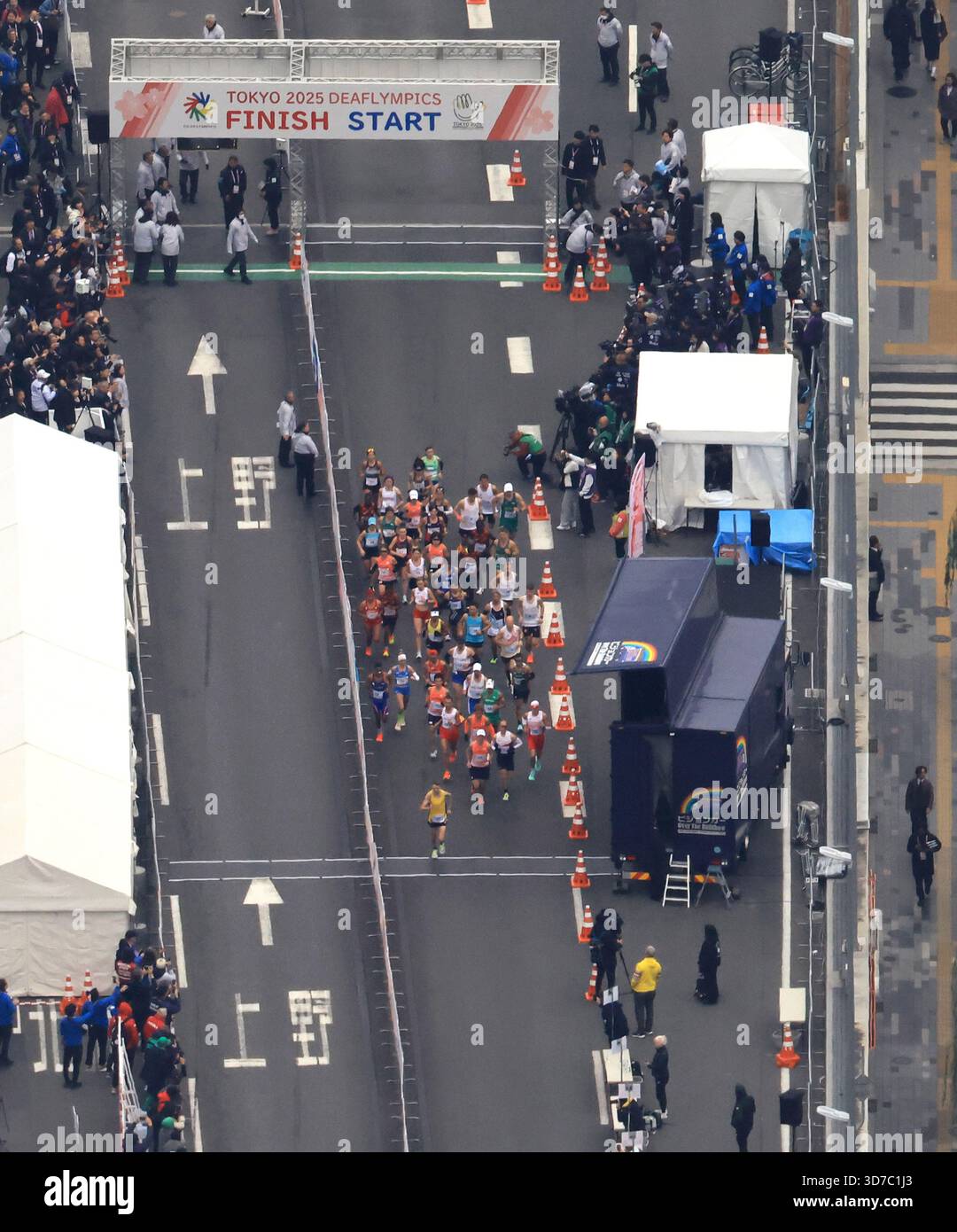 An aerial photo shows athletes compete in the Men's Marathon at the ...