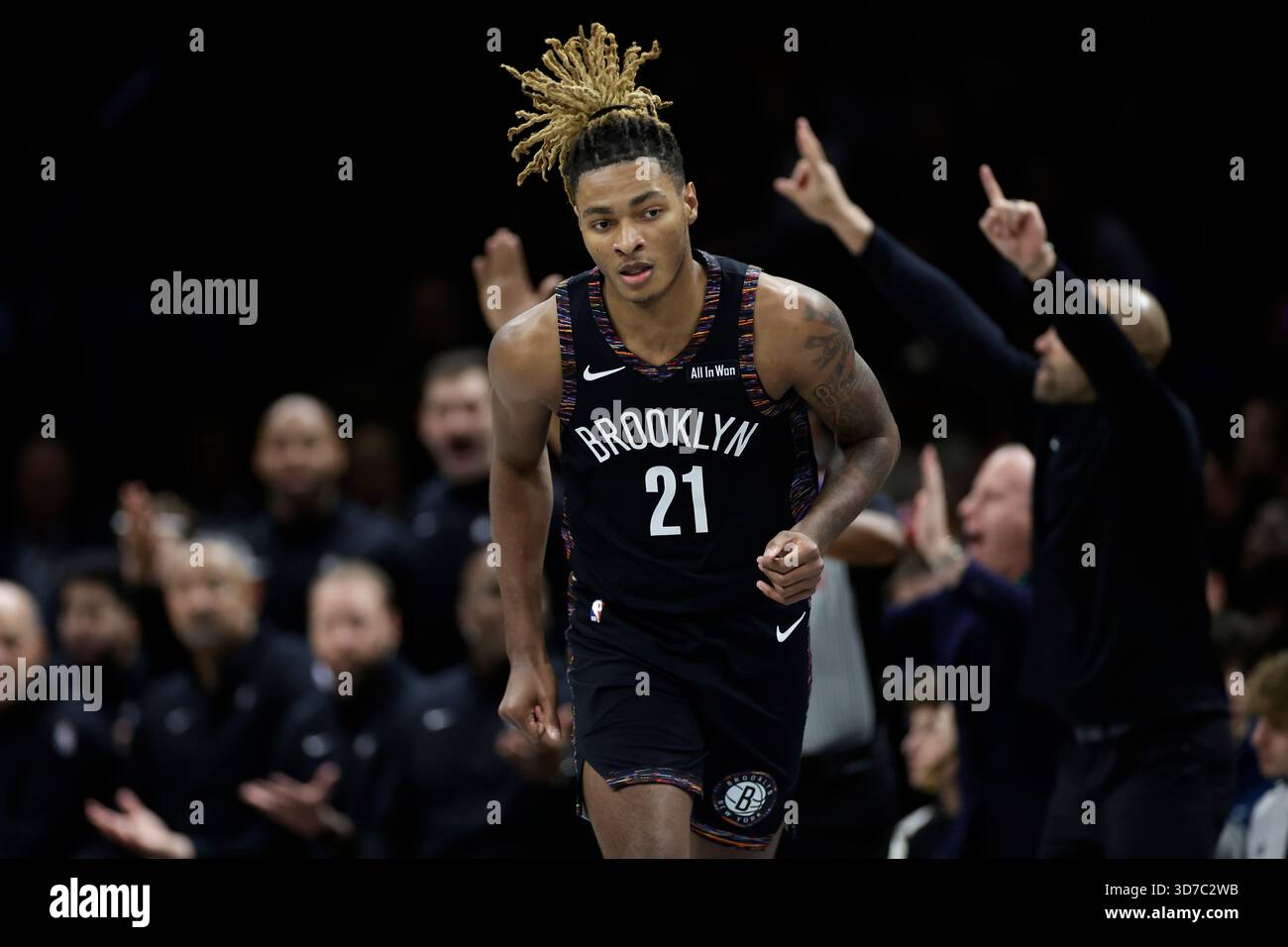 Brooklyn Nets forward Noah Clowney (21) reacts after making a three ...