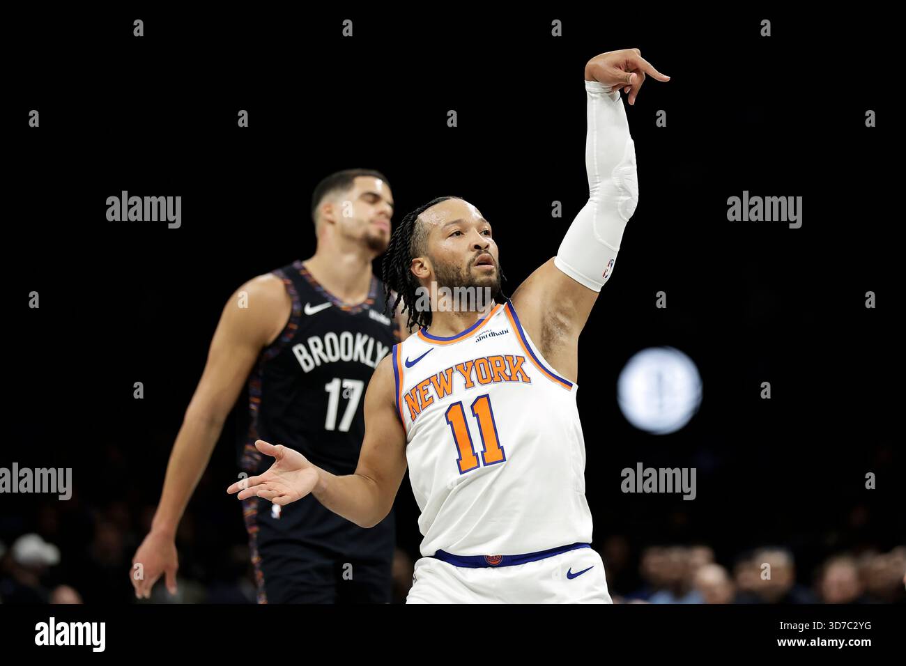 New York Knicks guard Jalen Brunson (11) reacts after making a three ...